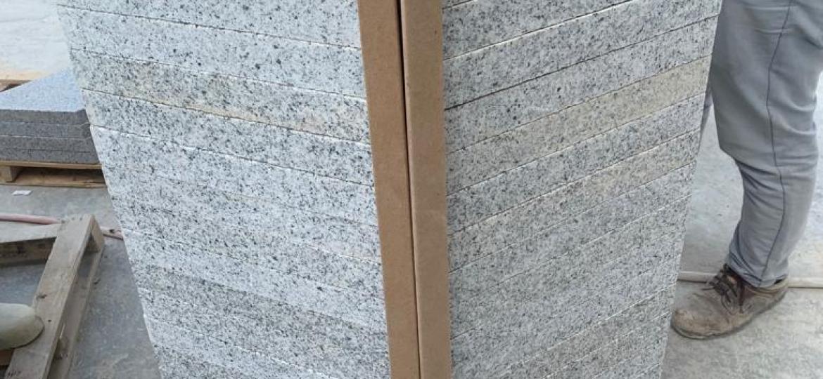 light grey granite in sandblasted finish and parallelogram form