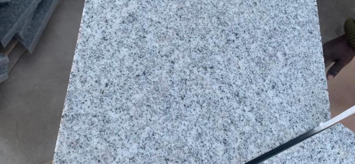 light grey granite in sandblasted finish and parallelogram form